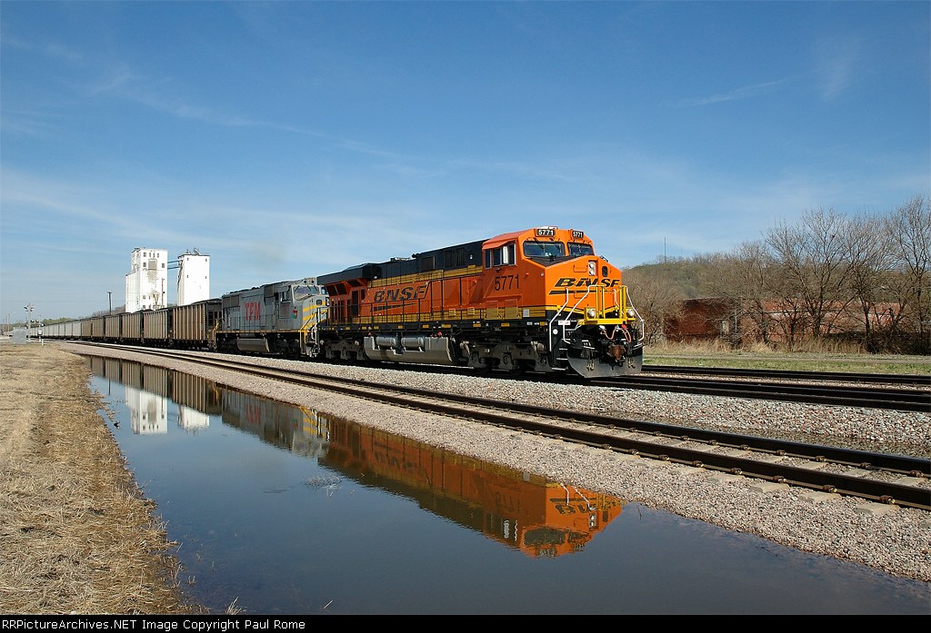 BNSF 5771 and reflection, works coal loads southbound